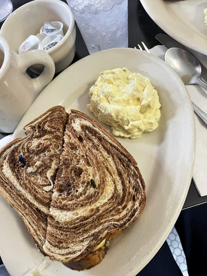 The Reuben arrives with potato salad like your grandmother's secret recipe&mdash;if your grandmother had a PhD in comfort food.