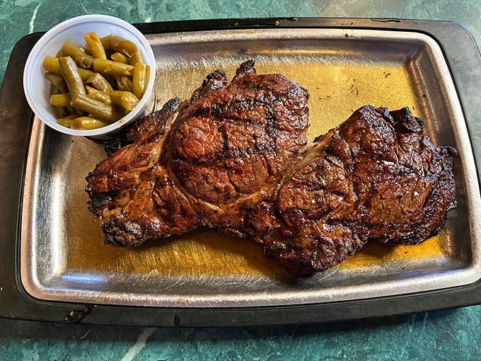 This isn't just a steak; it's a statement piece. The kind of ribeye that makes vegetarians question their life choices.