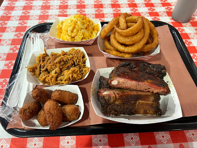 Behold: the barbecue platter of your dreams. That mac and cheese isn't just a side&mdash;it's making a compelling argument to be the main event.