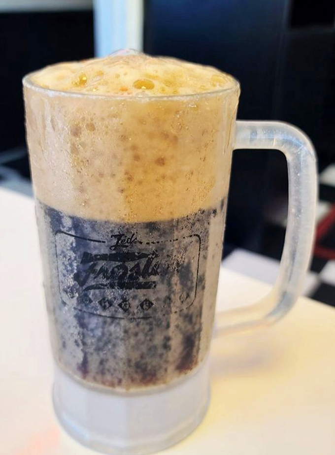 Behold the crown jewel: a frosted mug of root beer with a head so perfect it deserves its own Instagram account.
