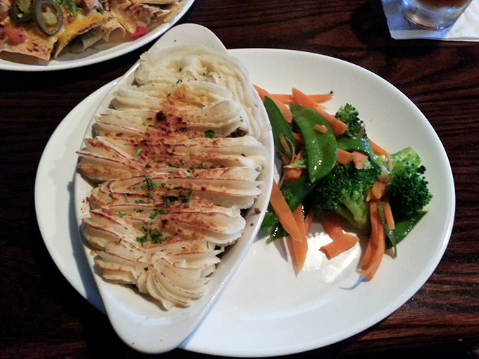 Shepherd's pie perfection &ndash; a golden-brown potato landscape covering a savory treasure of meat and vegetables that would make any Irish grandmother nod in approval.