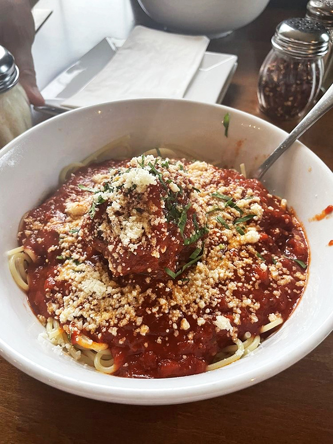 This isn't just spaghetti and meatballs; it's a bowl of happiness that would make your Italian grandmother weep with pride.