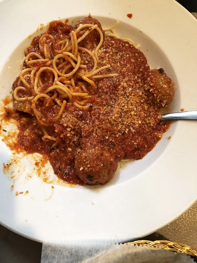 Spaghetti and meatballs—the comfort food equivalent of a warm hug from someone who genuinely likes you. That sauce has stories to tell.