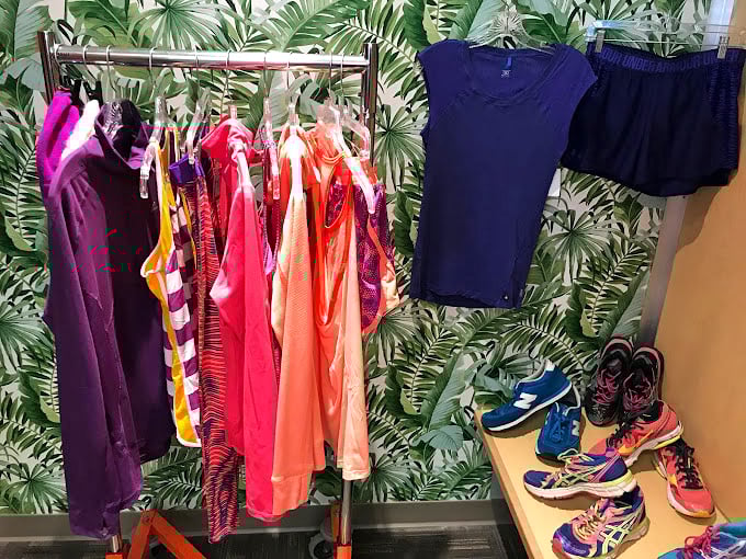 Athleisure paradise against tropical wallpaper. Where else can your workout wardrobe get a refresh while feeling like you've stepped into Miami Vice?