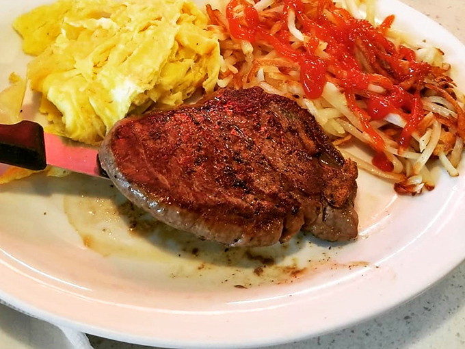 Breakfast of champions: a perfectly seared steak alongside scrambled eggs and crispy hashbrowns. Monday mornings suddenly don't seem so bad.