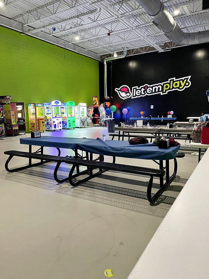 The "Let 'em Play" area offers parents a much-needed respite while keeping the little ones within eyesight. Strategic parenting at its finest!