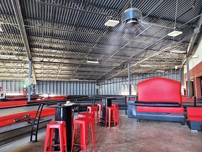 The pit stop lounge offers a moment of reprieve between races, where adrenaline-soaked stories flow as freely as the beverages.