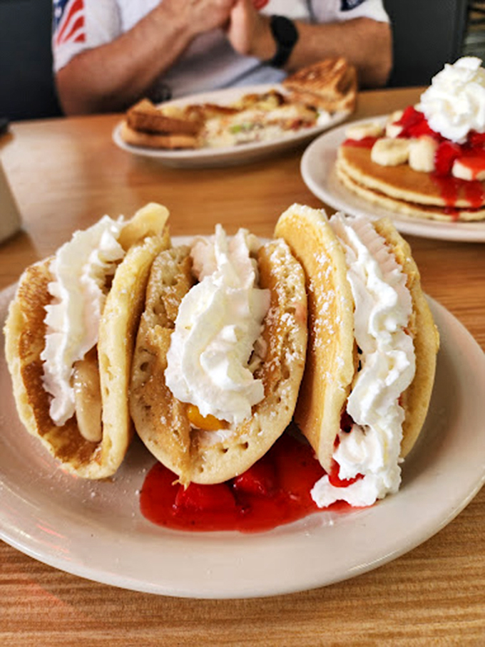 These pancakes aren't just wearing whipped cream&mdash;they're dressed for the most delicious formal event of the morning. Fruit and cream: breakfast's power couple.
