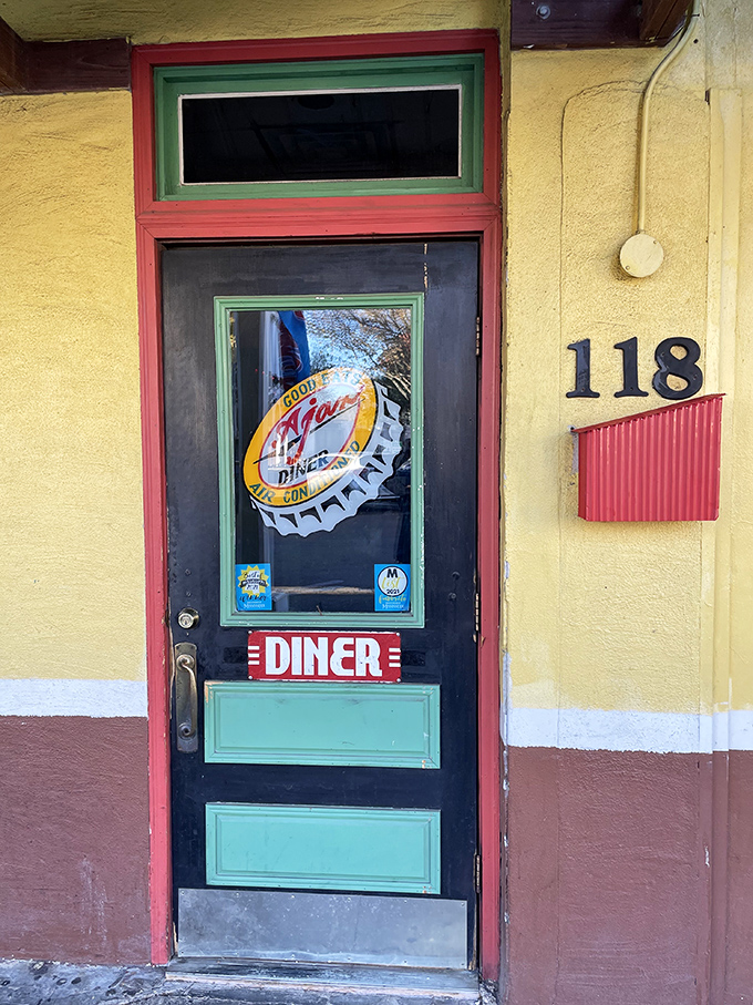 Ajax Diner's vibrant yellow exterior and colorful trim stand out on Oxford's square like a sunny personality at a board meeting. P