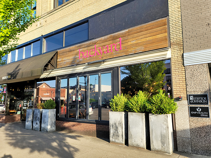 Backyard Pizza's modern facade brings a touch of urban cool to Huntington's food scene.