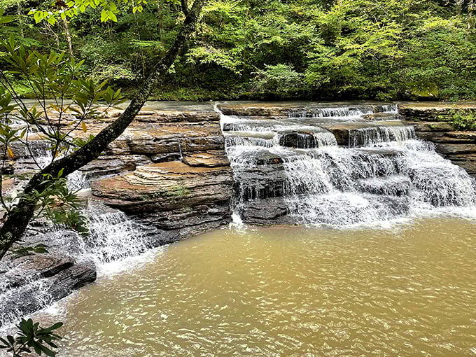 Camp Creek's natural waterpark! These tiered falls create crystal-clear pools that beat any resort swimming hole hands down.