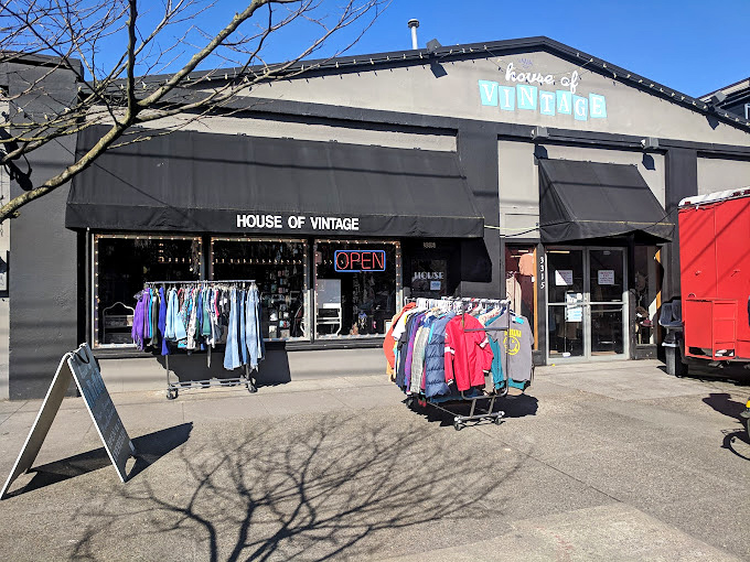 House of Vintage: Where yesterday's fashion becomes tomorrow's statement piece. Racks of possibility await just beyond those unassuming doors.