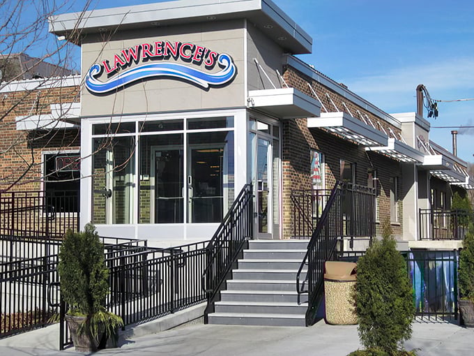 Lawrence's building might be understated, but that giant red shrimp on the sign sure isn't mincing words about what they do best.