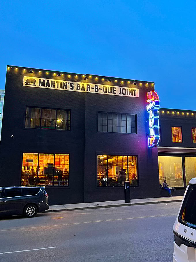 Martin's electric sign lights up Downtown Nashville like a BBQ beacon. Follow it to whole hog heaven! 