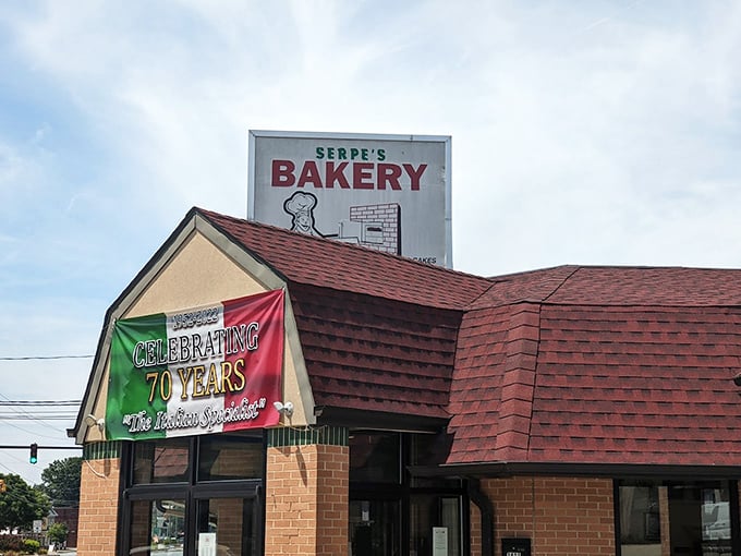 Serpe's 70-year banner isn't just decoration—it's a medal of honor in the bakery world, where consistency is the true secret ingredient.