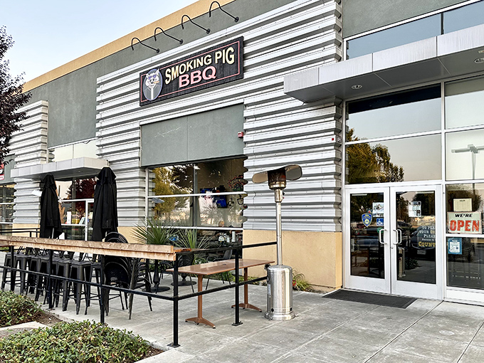 Smoking Pig BBQ: Industrial on the outside, pure barbecue magic within. Those corrugated metal walls hide smoky treasures.