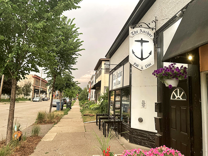The Anchor's charming facade: Flower boxes and an anchor sign&mdash;this corner spot looks like it was plucked straight from a British seaside village.