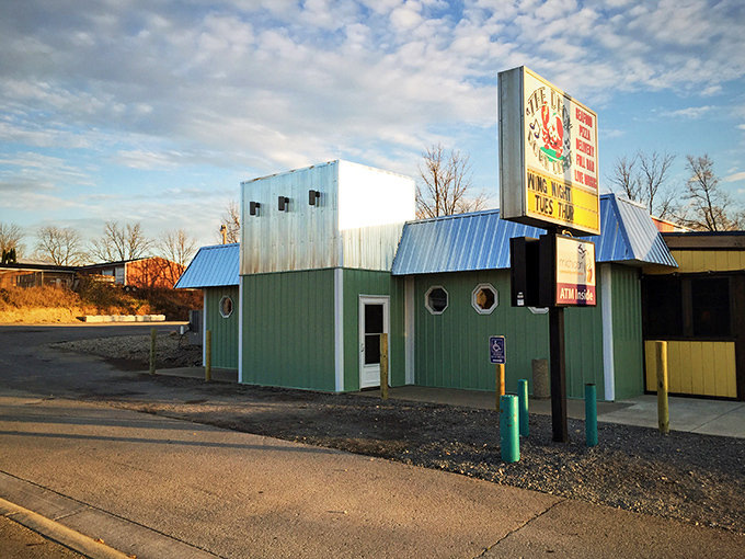 The Deck Down Under looks like it floated inland from some coastal paradise, portholes and all.