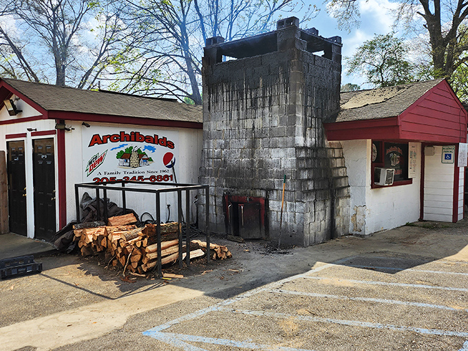 The smoke-blackened chimney at Archibald's tells no lies. This BBQ battlestation has launched thousands of perfect ribs into happy mouths.