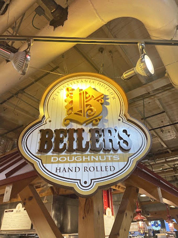 The charming green-tiled facade of Oram's – where donuts are still made the old-fashioned way: enormous and delicious.