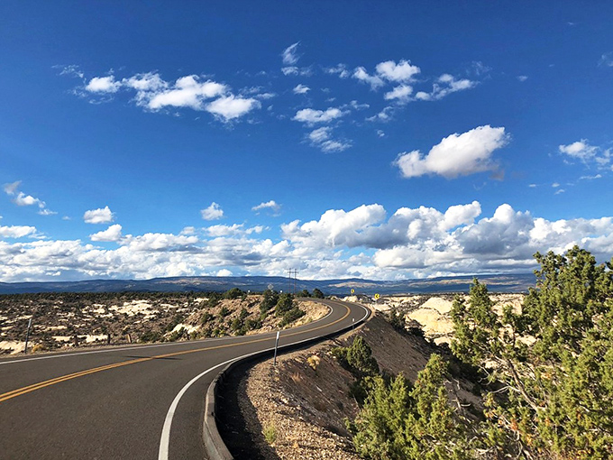 Highway 12 near Boulder winds through Utah's breathtaking scenery, where big sky meets endless adventure on one of America's most scenic drives.