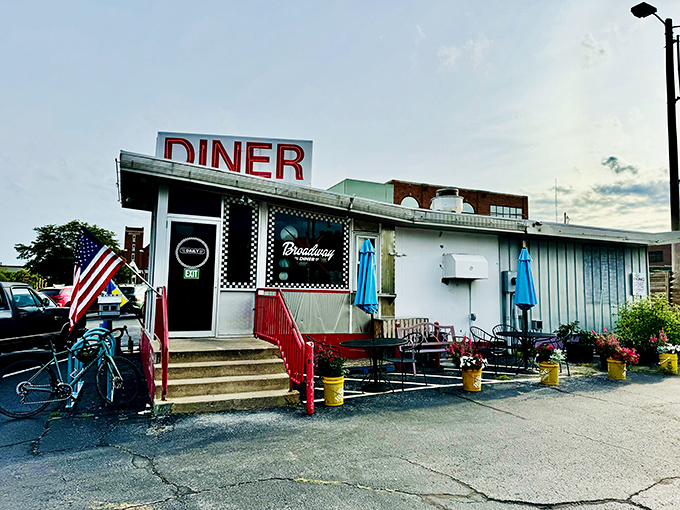 The checkered facade and vintage "DINER" sign promise the kind of breakfast that champions are made of.