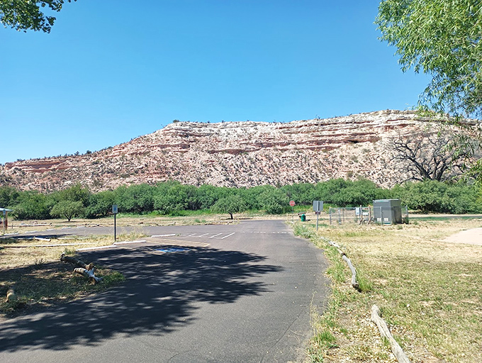 Red rock formations rise majestically behind Dead Horse Ranch, nature's version of a theatrical backdrop.