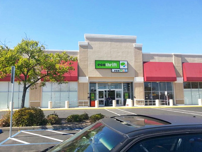 Beyond these doors lies a color-coded kingdom of discounts. Eco Thrift's simple exterior belies its vast bargain universe within.