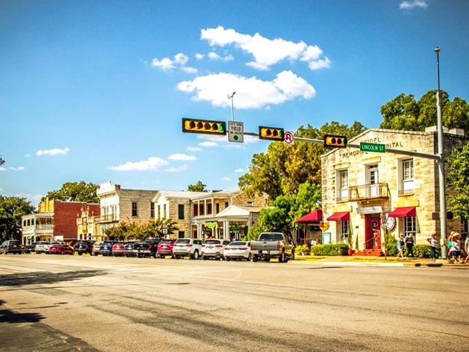 The iconic City Block sign stands proud in Fredericksburg, where German heritage and Texas swagger create an irresistible cultural schnitzel.