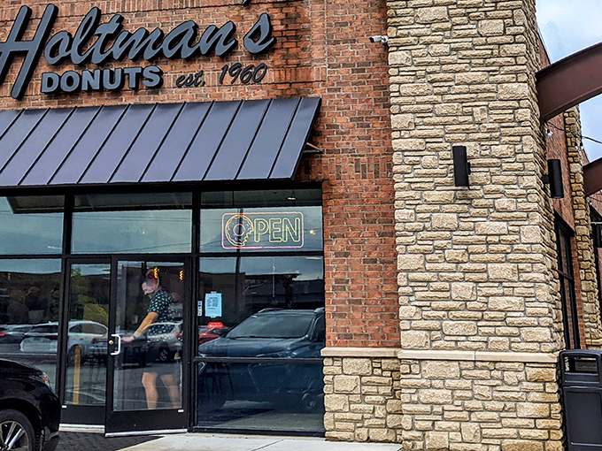 Behind these brick and stone walls, donut artisans craft the kind of pastries that make dietitians weep and customers rejoice.