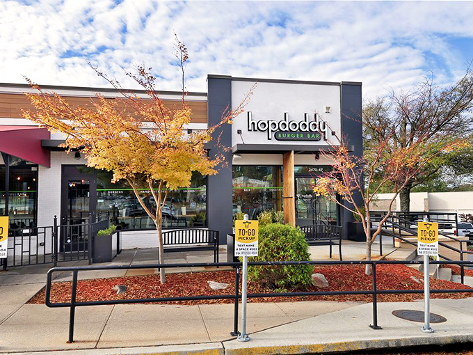 Fall colors frame Hopdoddy's sleek exterior, promising artisanal burger creations that turn first-timers into regulars.