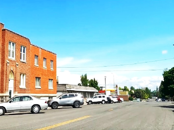 The classic three-story brick building watches over Jerome's Main Street &ndash; a silent witness to a century of small-town life.