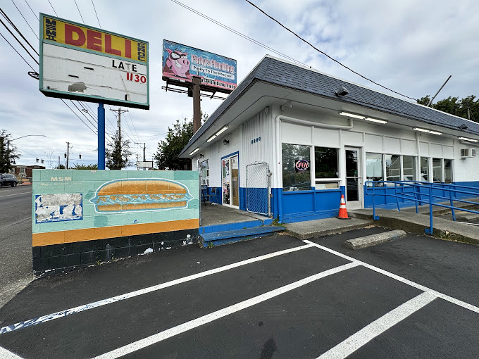 That vintage sign has been directing sandwich enthusiasts to this Tacoma institution longer than some neighborhoods have existed.