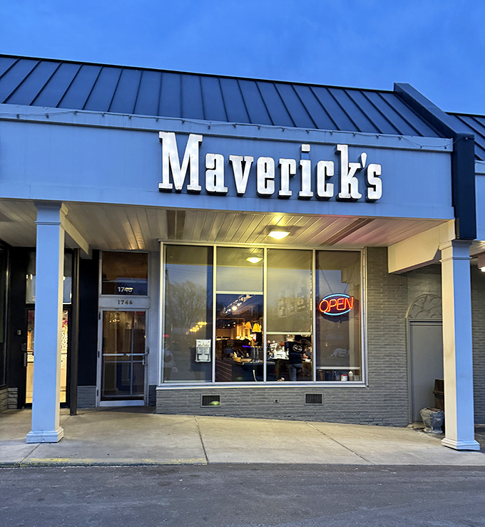 As evening approaches, Maverick's glowing "OPEN" sign beckons sandwich pilgrims to their roast beef mecca.
