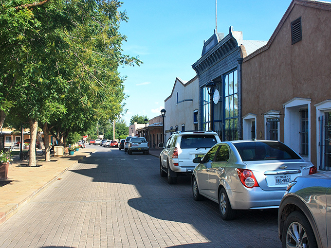 Brick sidewalks and shaded storefronts invite leisurely exploration in a town where history whispers from every corner.