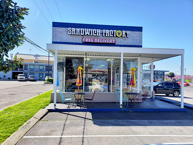 Those cheerful outdoor tables are sending you a message: life's too short for sad desk lunches when sandwich paradise awaits.