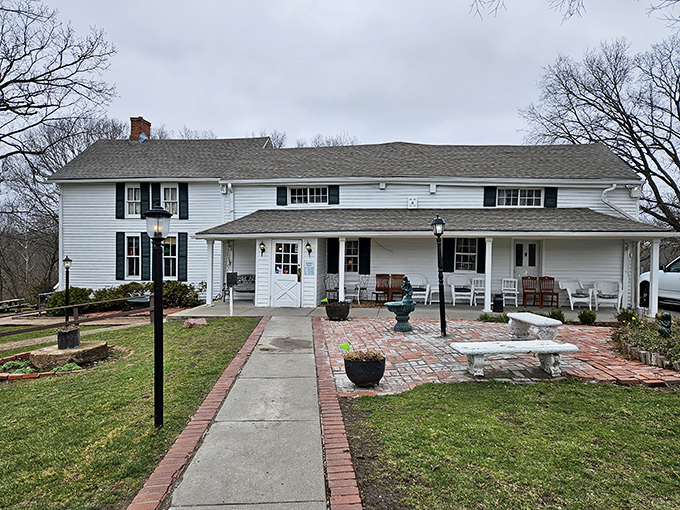 That welcoming front porch and classic farmhouse style hints at the old-fashioned goodness waiting inside Stroud's historic dining rooms.