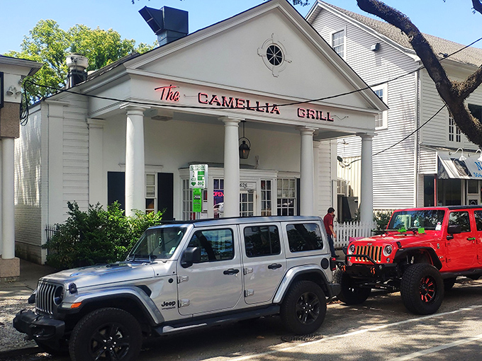 That pink bench outside is where friendships form, all united by the universal language of "waiting for amazing waffles."
