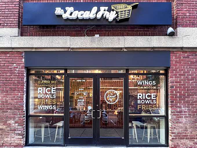 Behind these modern doors, traditional fried chicken gets dressed up with international flavors. A delicious passport, no travel required!