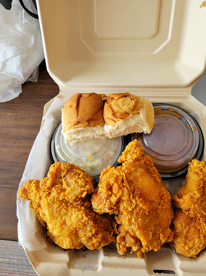 A white box filled with crispy, golden treasures &ndash; proof that sometimes the best things in life come in simple packaging. 