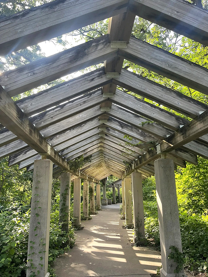 This pergola walkway isn't just Instagram-worthy—it's a time machine to more genteel days when people "promenaded" instead of "walked."