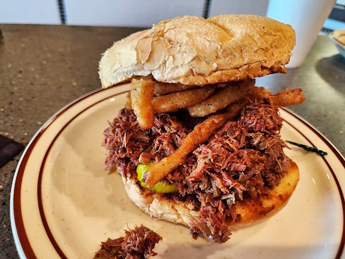 This BBQ brisket sandwich isn't messing around&mdash;tender meat piled high with crispy fries on top because why choose between courses?