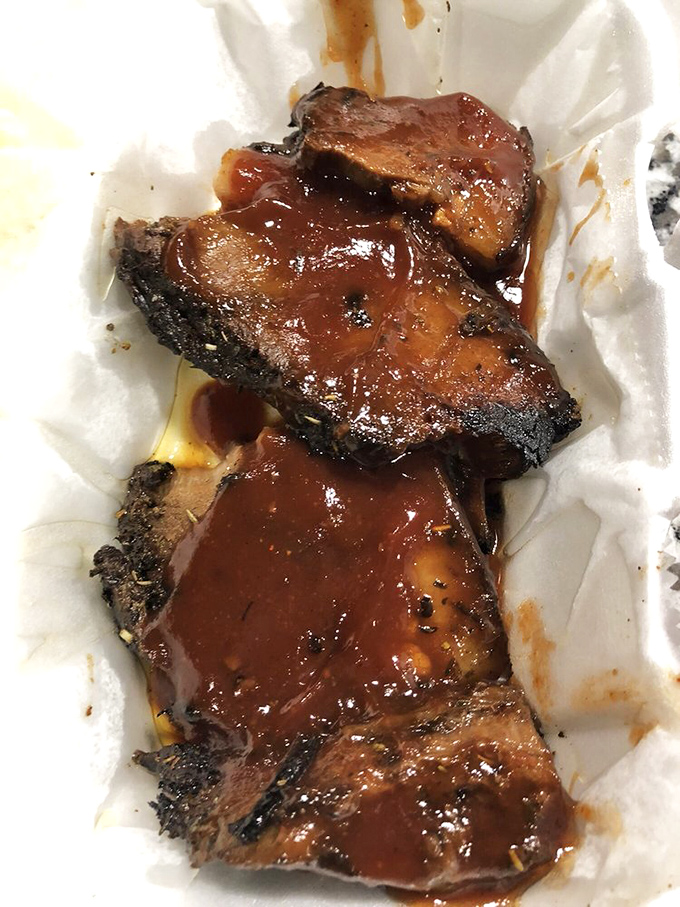 Brisket that doesn't just melt in your mouth&mdash;it starts a party there. That dark crust and those juices are speaking a language only true barbecue lovers understand.