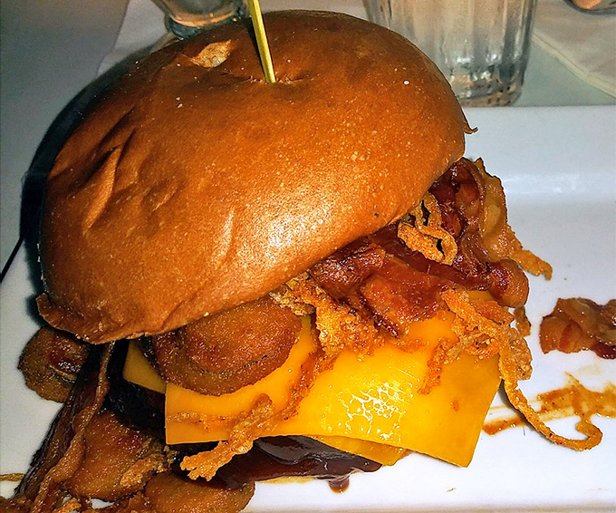 Houston, we have a solution to hunger! This towering BBQ burger with crispy onions and melted cheese is one small step for man, one giant leap for lunch.