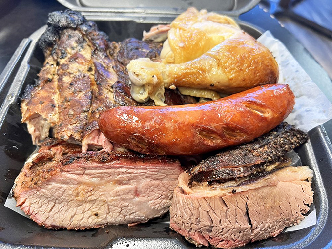 The barbecue sampler that ruins diets and creates memories. That smoke ring on the brisket is the equivalent of a Michelin star in the barbecue universe.