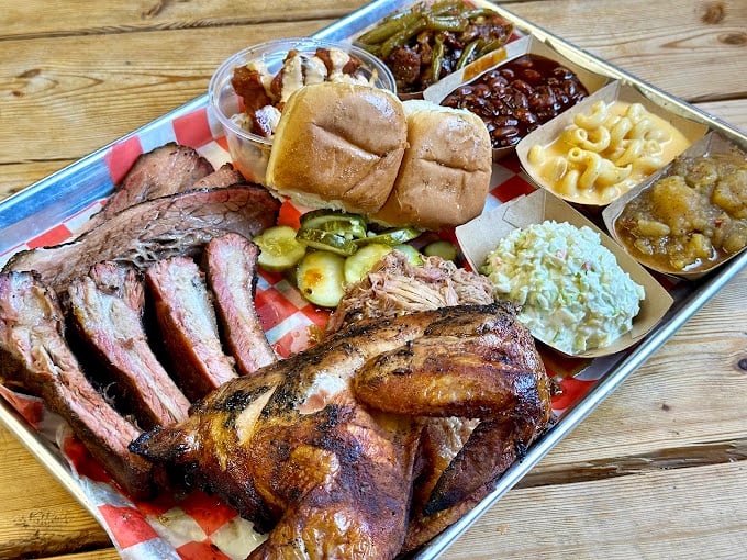 This metal tray holds more joy than most people experience in a month. The smoke ring on that brisket is practically wearing a halo.