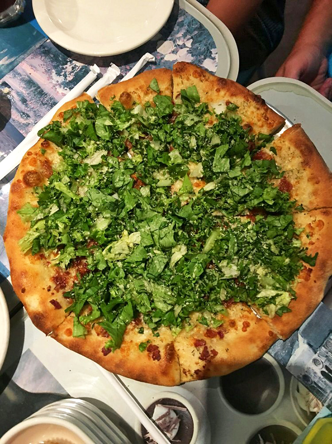 They've done the impossible&mdash;transformed the beloved BLT sandwich into pizza form. The fresh lettuce on top isn't just garnish, it's a revolution.