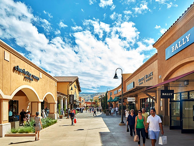 The Mediterranean-inspired walkways feel more like a European village than an outlet mall. Bally and other luxury shops await.