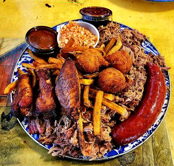 The barbecue platter that answers life's most important question: "Why choose one meat when you can have them all?"