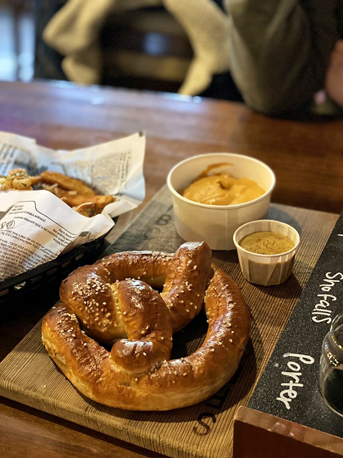 This pretzel isn't just a snack, it's architecture&mdash;golden-brown perfection with salt crystals that sparkle like tiny culinary diamonds.
